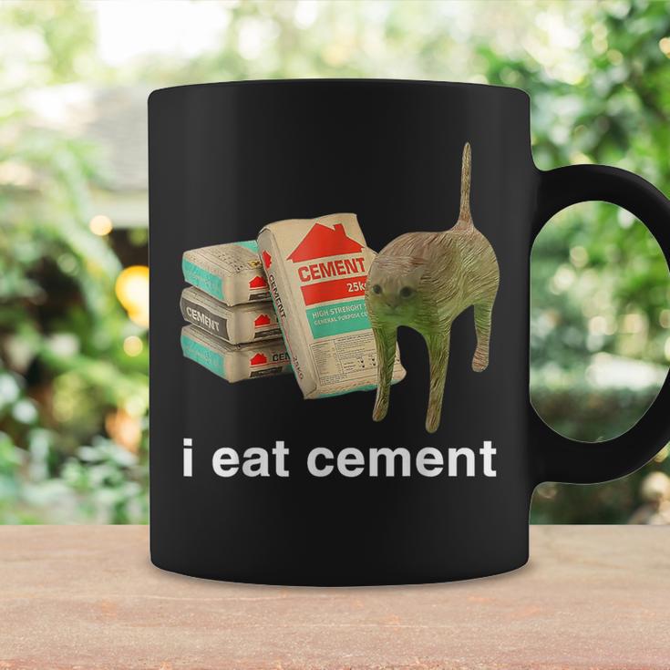 I Eat Cement Cursed Cat Oddly Specific Meme Coffee Mug | Mazezy