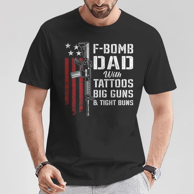 F Bomb Dad Tattoos Big Guns Tight Buns Gun On Back T-Shirt - Monsterry